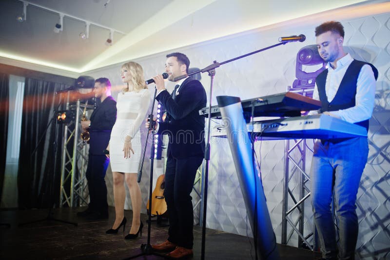 Musicial Music Live Band Performing on a Stage Stock Image - Image of ...