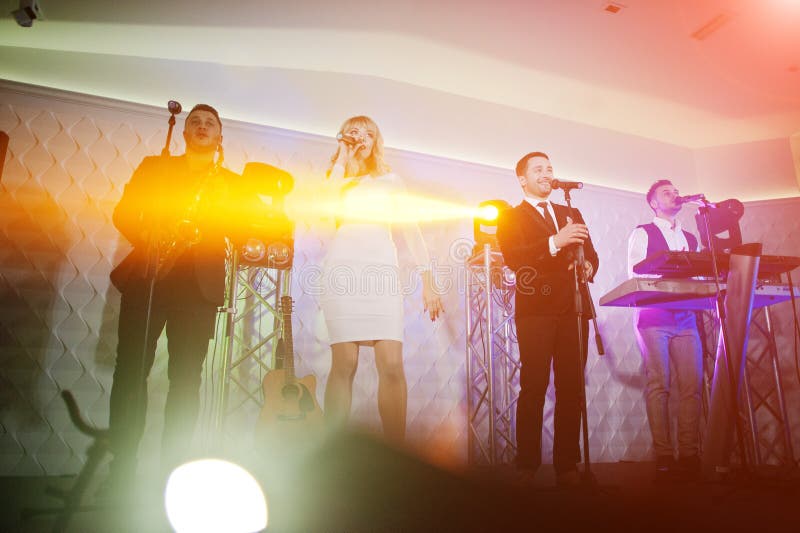 Musicial Music Live Band Performing on a Stage Stock Image - Image of ...