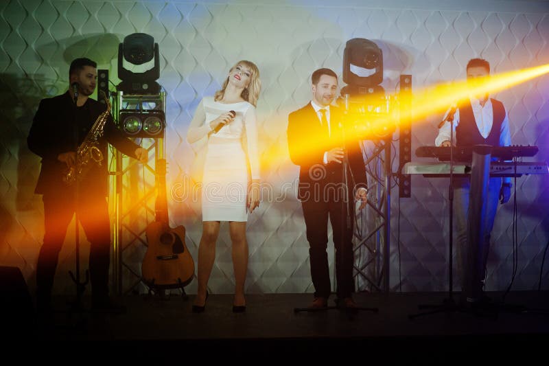 Musicial Music Live Band Performing on a Stage Stock Image - Image of ...