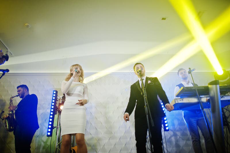 Musicial Music Live Band Performing on a Stage Stock Image - Image of ...