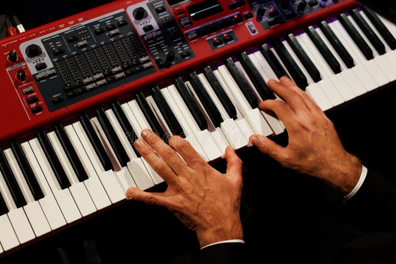Musician Hands on the Modern Piano Keyboard Keys, Top View Stock Photo ...