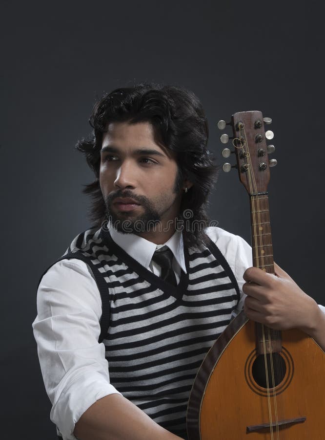 Musician Holding a Lute and Thinking Stock Photo - Image of view ...