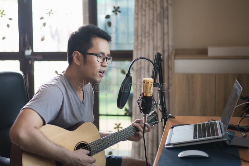 Musician Man Recording Music at the Music Home Studio Stock Image ...