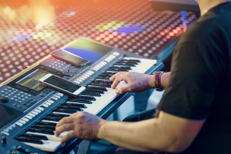 Musician Play Electronic Keyboard Synthesizers by Using Smartphone As ...