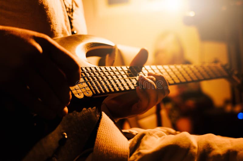 Musician Playing Electric Guitar Close-up on Hands and Strings Stock ...