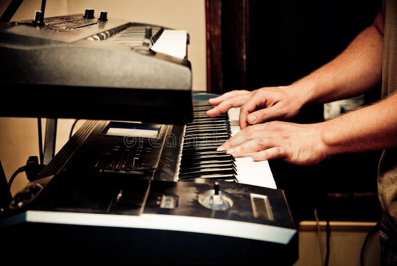 Musician Playing Synthesizer Stock Image - Image of performer ...