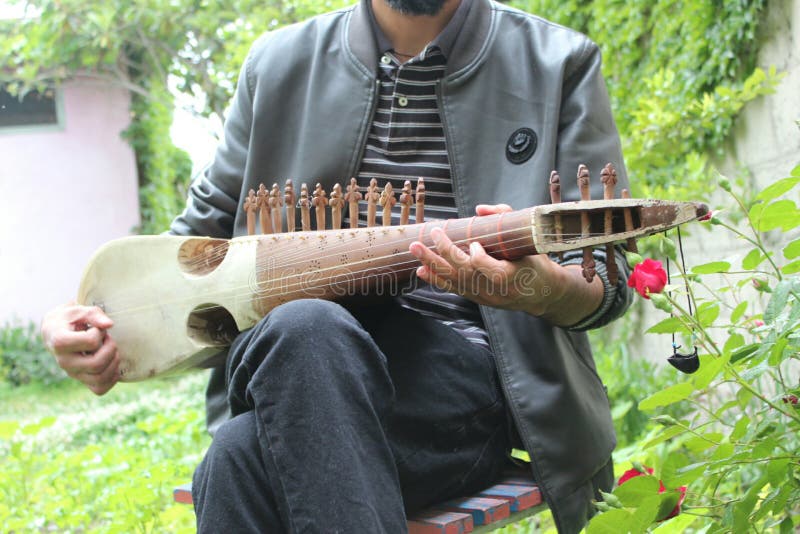 A Musician is Playing a Traditional Rubab Stock Image - Image of rabab ...