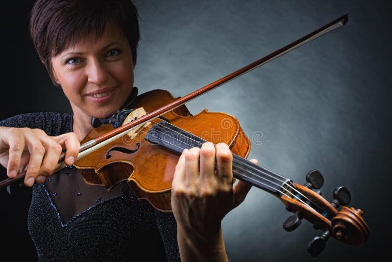 Musician playing violin stock photo. Image of musician - 25261490