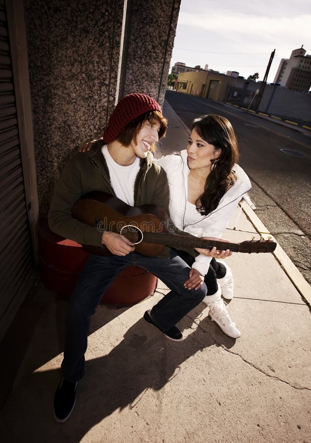 Musician and Pretty Girlfriend Downtown Stock Image - Image of ...