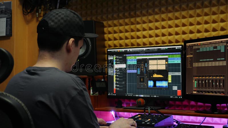 Songwriter Mixing and Mastering Tracks on Stereo Console Stock Video ... Songwriter Mixing and Mastering Tracks on Stereo Console Stock Video ...