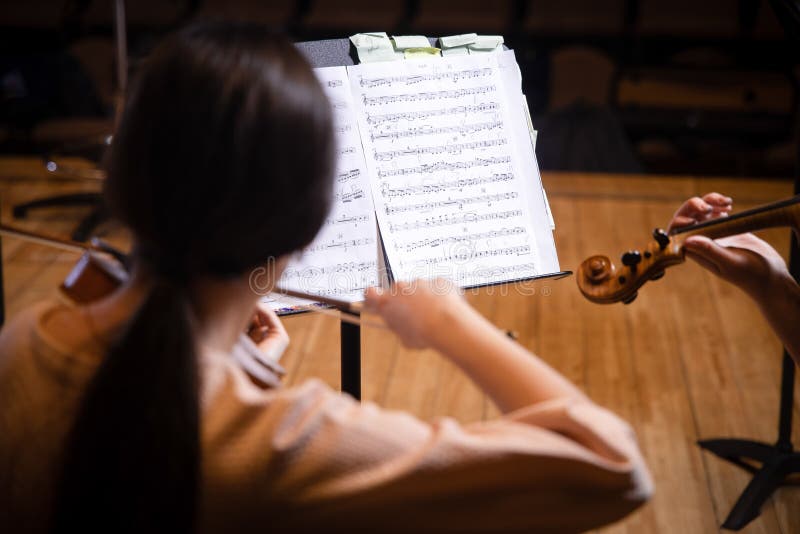 Musicians during Classical Music Concert, Playing Violins Stock Photo ...