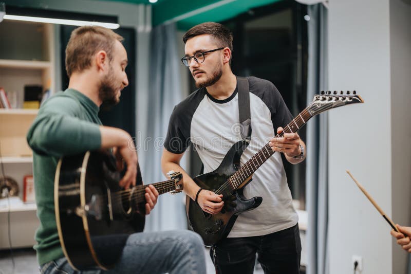 Musicians Collaborating and Creating Music Together in a Professional ...