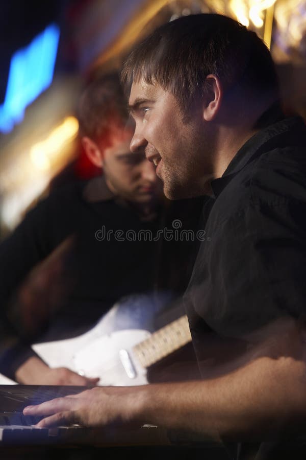 Musicians in Performance stock image. Image of playing - 33891543