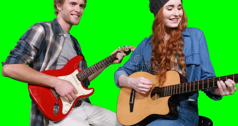 Musicians playing guitars stock video. Video of cheerful - 88337967