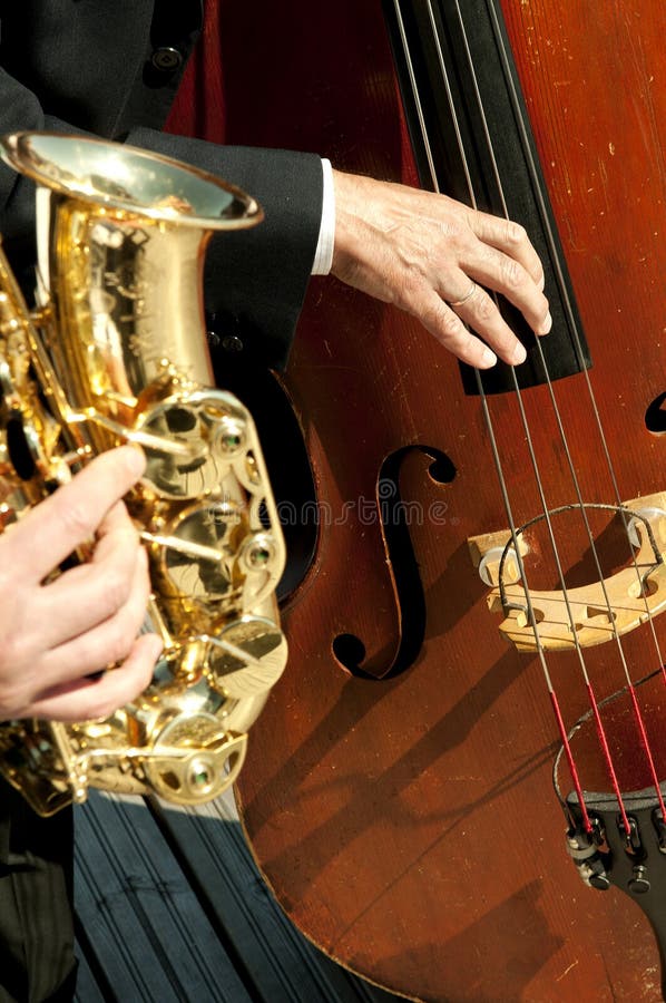 Musicians Playing Instruments in the Sun Stock Photo - Image of artists ...