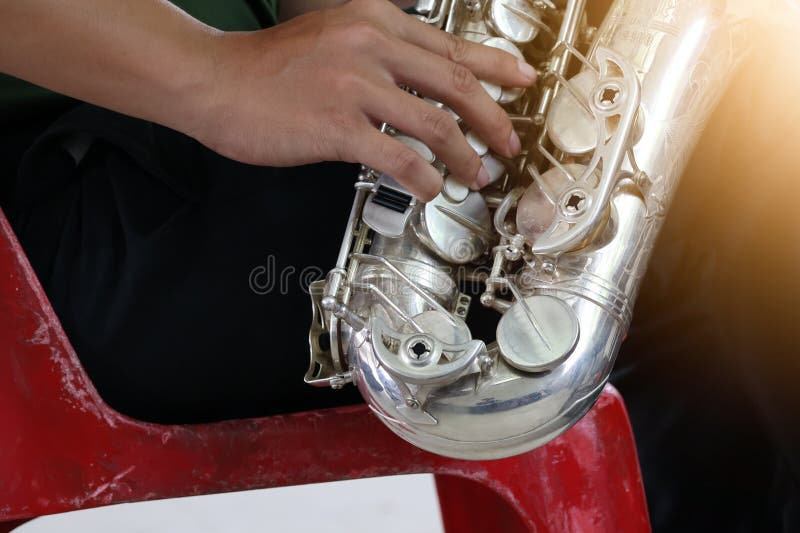 Musicians Practicing Playing Saxophone in Music Classroom. Selective ...
