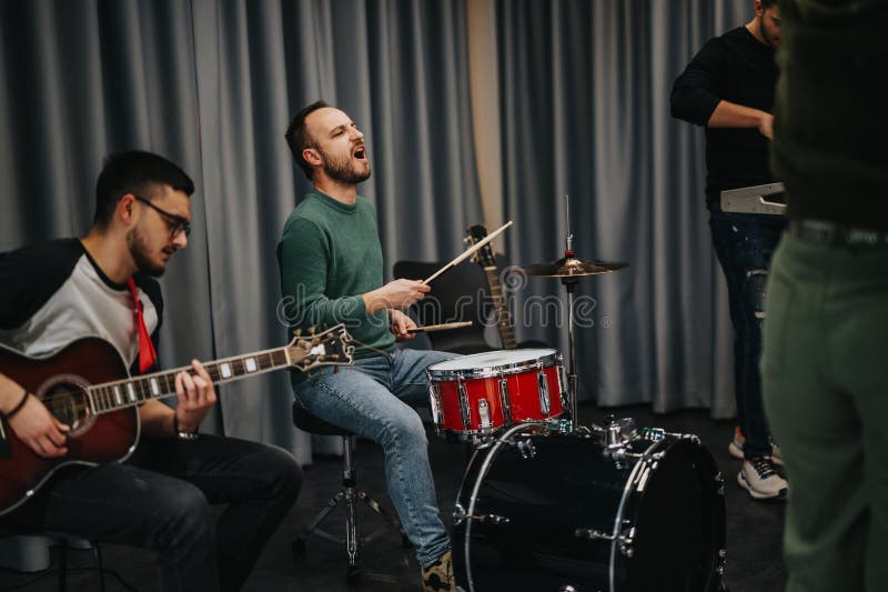 Musicians Practicing Together in a Music Studio with Instruments Stock ...