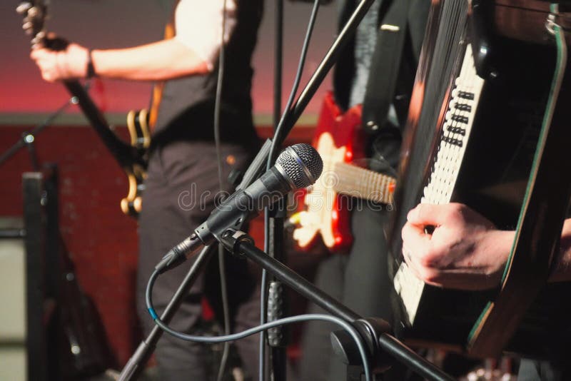 Musicians on stage in bar stock photo. Image of backdrop - 114044932