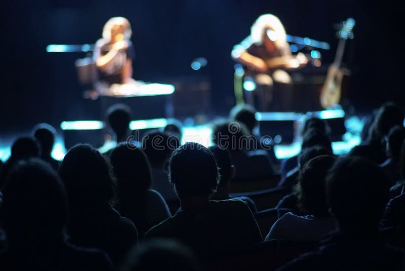 Silhouette Of Young Man At Music Gig, View From Behind, Blurred ...