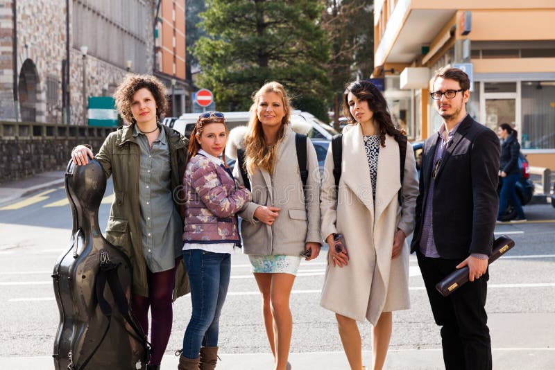 Five Musicians Along the Avenue Stock Photo - Image of standing ...