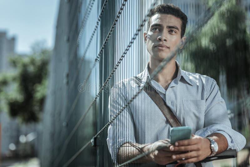 Musing Handsome Guy Calling Online on Phone Stock Image - Image of ...