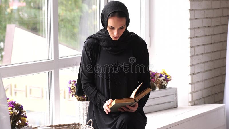 Muslim Arabic Female Reading Book at Home. Stock Image - Image of book ...