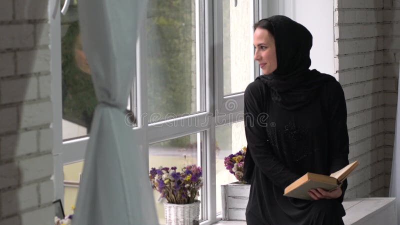 Muslim Arabic Female Reading Book at Home Stock Photo - Image of book ...