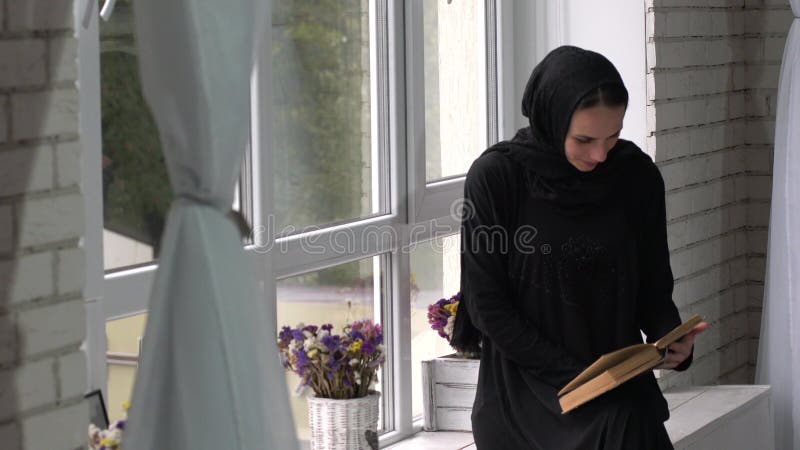 Muslim Arabic Female Reading Book at Home Stock Image - Image of hijab ...
