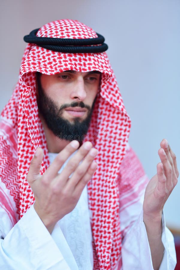 Muslim Arabic man praying stock photo. Image of black - 81070094
