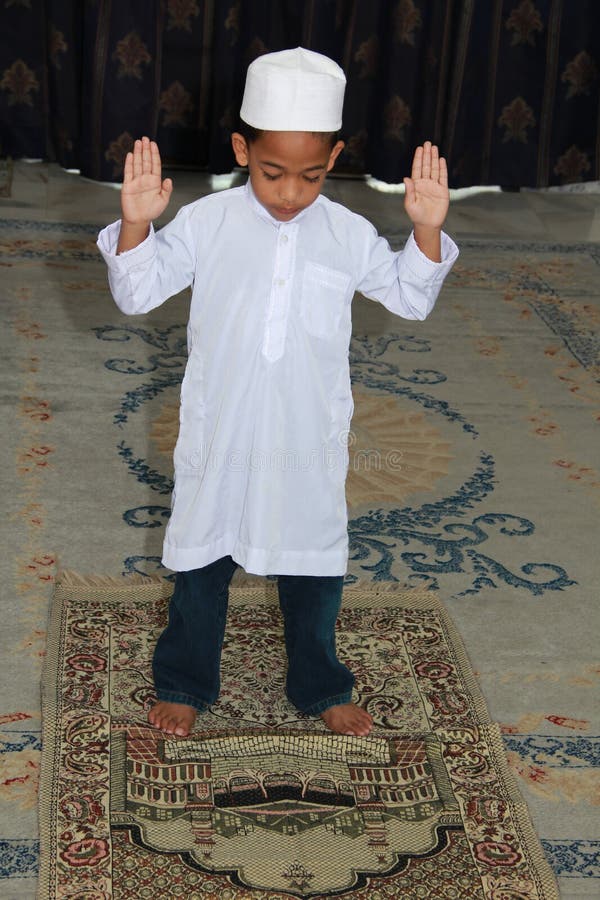 Muslim boy praying stock photo. Image of religious, religion - 24075554