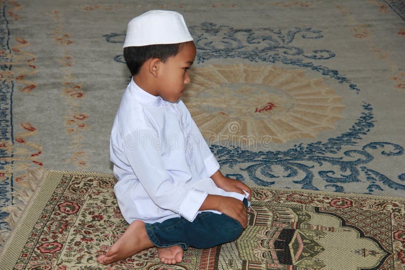Muslim boy praying stock photo. Image of belief, learn - 24075654