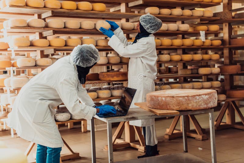 Muslim Business Partners Checking the Quality of Cheese in the Modern ...