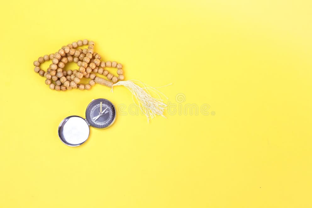 Muslim Compass,direction of Kaaba and Yellow Rosary Stock Image - Image ...