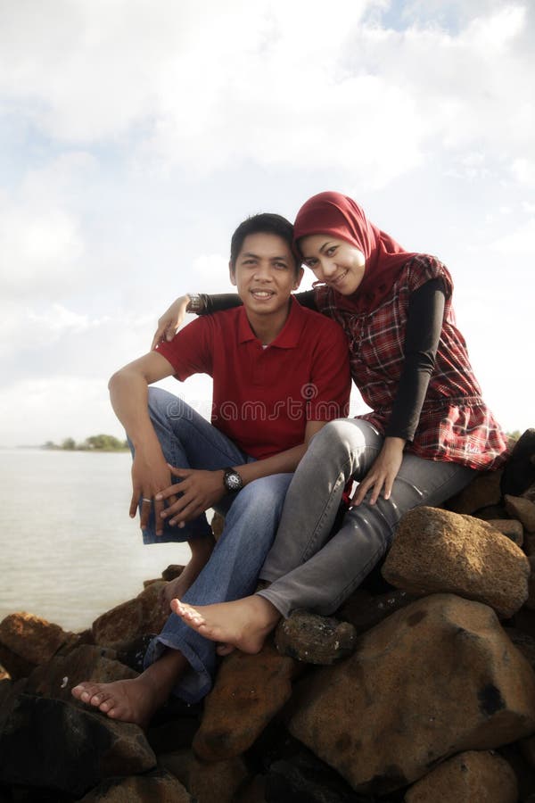 Muslim couple outdoor stock photo. Image of smile, hugging - 19325774