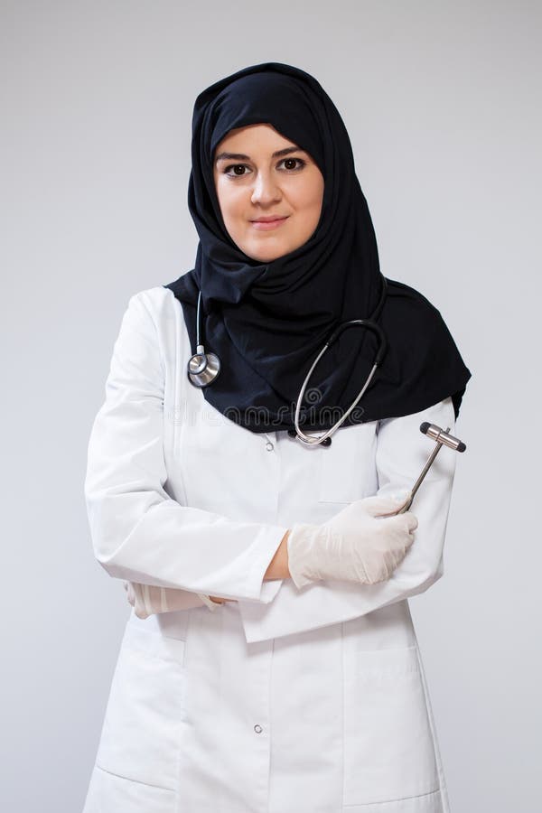 Muslim Doctor with Reflex Hammer Stock Photo - Image of hammer, doctor ...