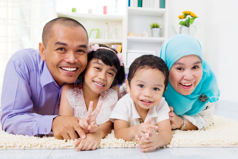 Muslim family stock photo. Image of floor, hijab, fatherhood - 32438844