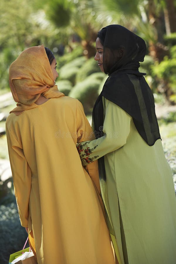 Muslim Friends in Traditional Wear Stock Photo - Image of clothing ...