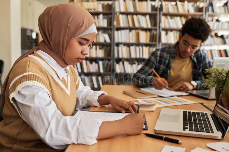 Muslim Girl Writing Exam in Class Stock Image - Image of group ...