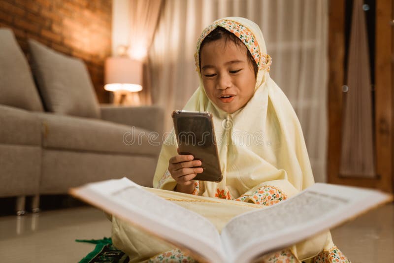 Muslim Kid Using Mobile Phone after Praying Stock Image - Image of ...