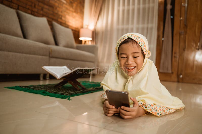 Muslim Kid Using Mobile Phone after Praying Stock Image - Image of ...