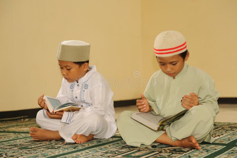 Islam, Child Reading Qur an Stock Photo - Image of muslim, spiritual ...