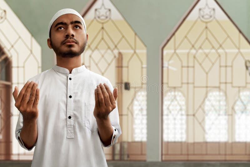Muslim man pray in mosque stock photo. Image of islam - 114036812
