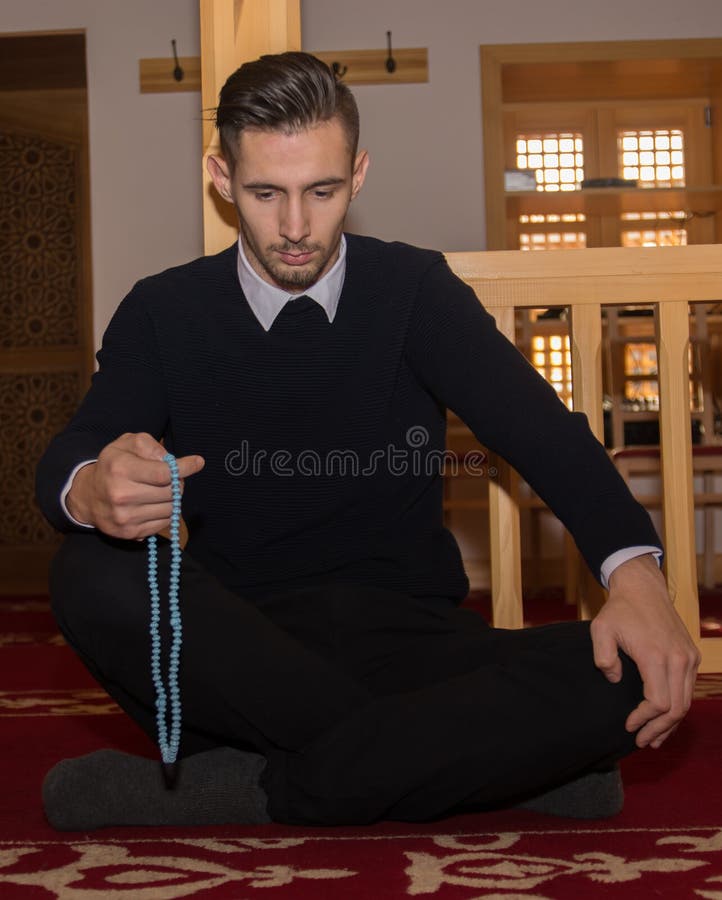 Muslim man pray in mosque stock image. Image of muslimmanreadingkoran ...