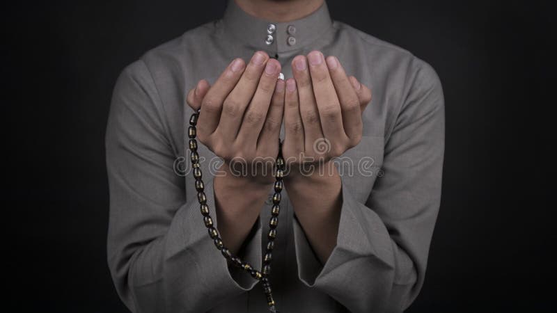 Muslim Man Praying Making Dua with Both Hands and Prayer Beads Stock ...