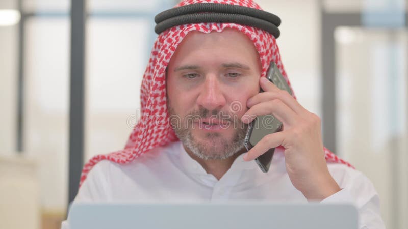 Muslim Man Talking on Phone, Doing Negotiation Stock Footage - Video of ...