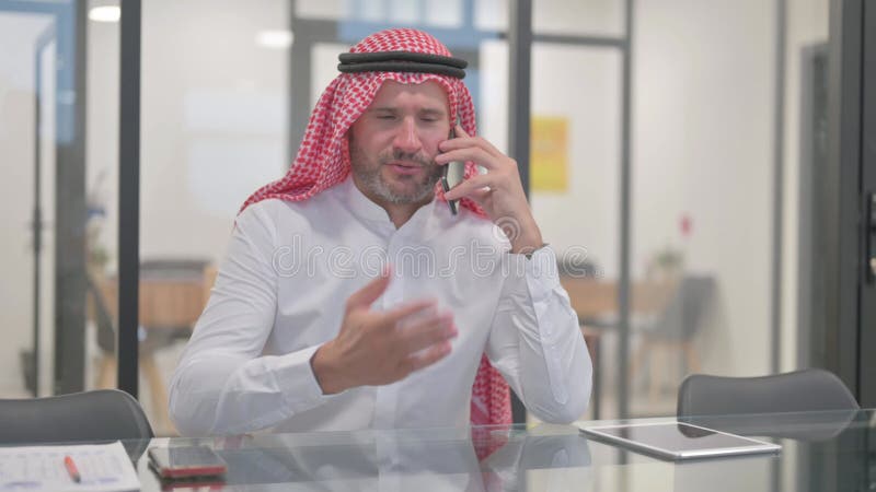 Muslim Man Talking on Phone in Office Stock Footage - Video of male ...
