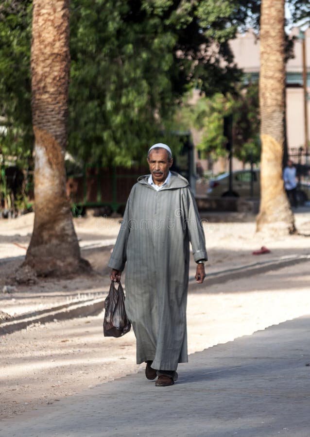 Muslim man walking editorial stock photo. Image of lonely - 57334158