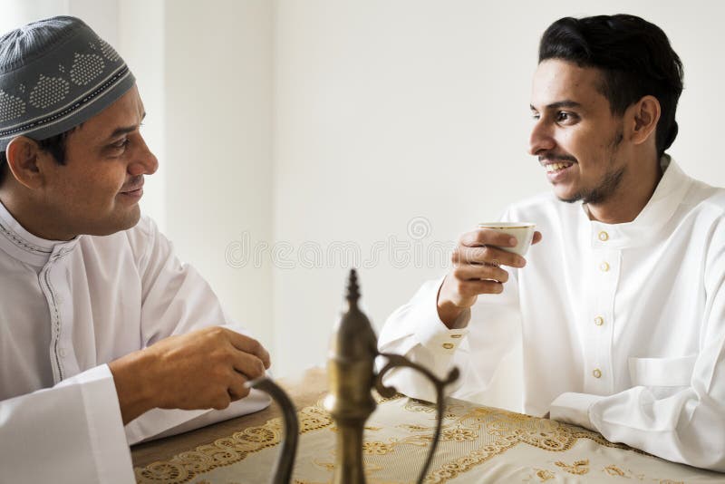 Muslim Men Having Tea Together Stock Photo - Image of cheerful, middle ...