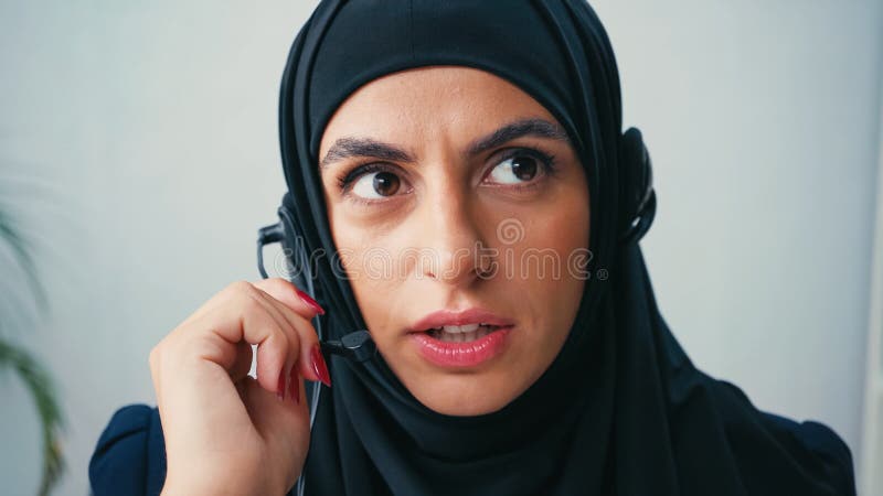 Muslim Operator Woman in Headset Using Computer Answering Customer Call ...