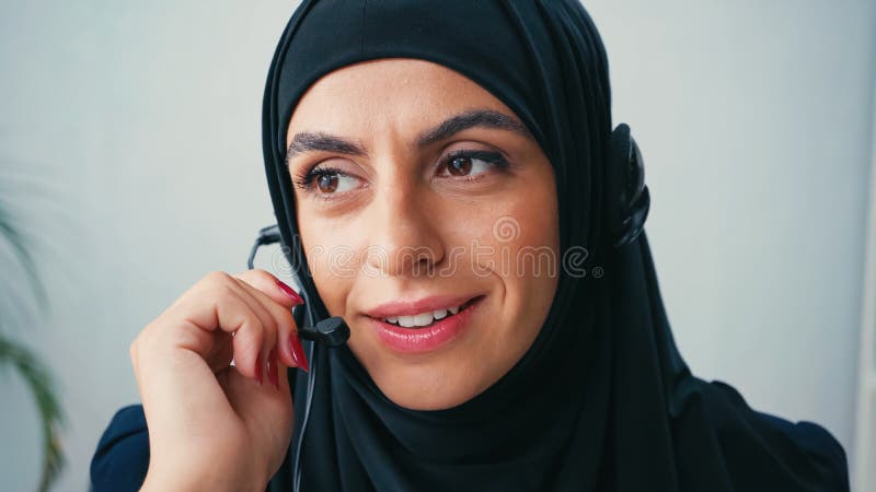 Muslim Operator Woman in Headset Using Computer Answering Customer Call ...